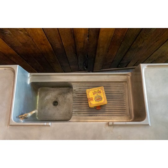 Oak bar counter with a pewter track and an integrated 1880 pewter sink