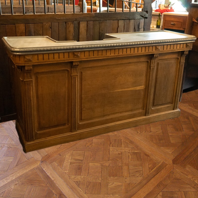 Oak bar counter with a pewter track and an integrated 1880 pewter sink